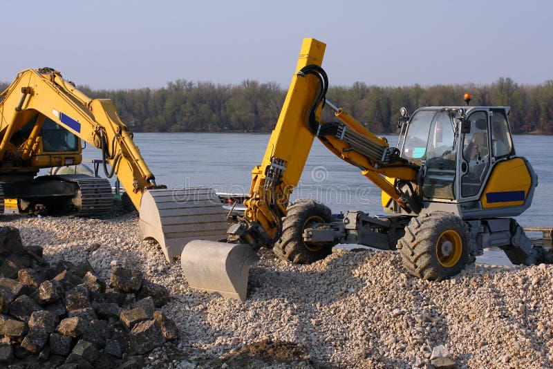 Construction vehicles stock photo. Image of rocks, outdoor - 24142708