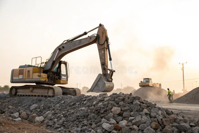 Construction Vehicles Working at Active Work Site Stock Illustration ...