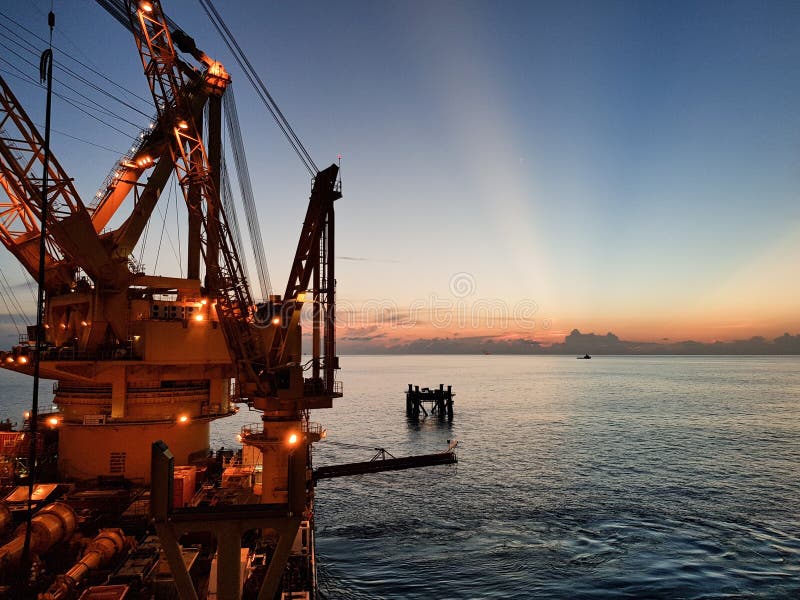 Construction Vessel and Sunset Stock Photo - Image of oceanscape ...