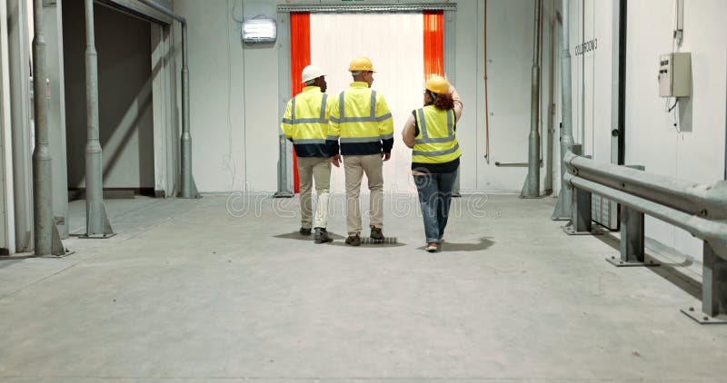 Back, Engineering and a Construction Worker Walking in a Warehouse for ...