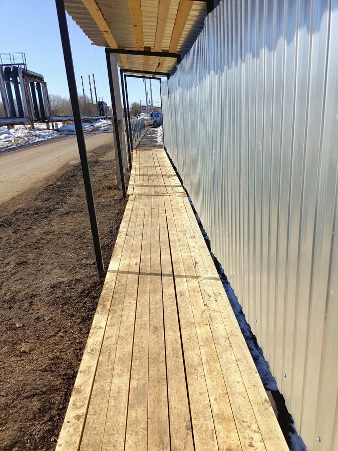 Construction Walkway Along a Metal Structure at a Development Site ...