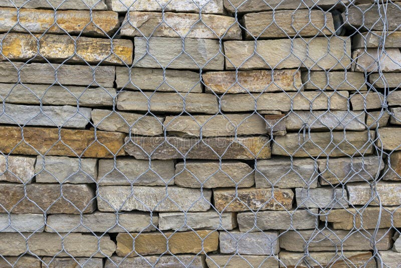 Solid Mesh stone wall 4 stock photo. Image of pattern - 100937830