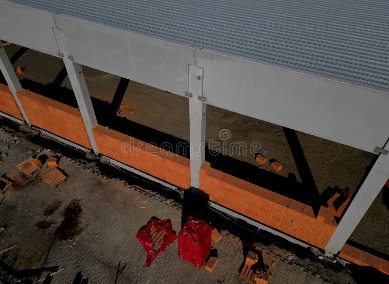 Construction of the Wall of Warehouse Building. between Columns Stock ...