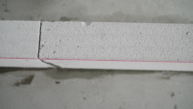 Construction of a Wall from White Blocks. Aligning the Wall Along the ...