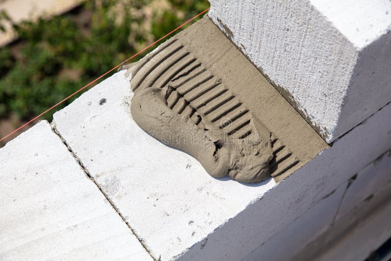 Construction of the Walls of the House from Foam Concrete Bricks Stock ...