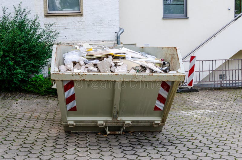 Construction Waste Container Full of Construction Waste Stock Photo ...