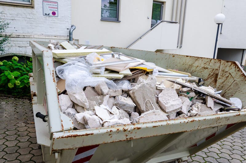Construction Waste Container Full of Construction Waste Stock Photo ...