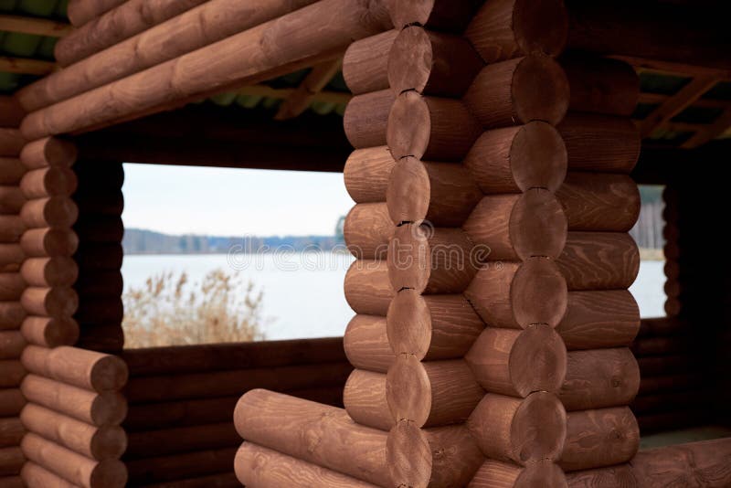Construction of a Wooden House from Round Log Stock Photo - Image of ...