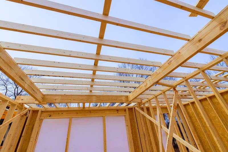 Construction of a Wooden Structure with Exposed Beams during a Clear ...
