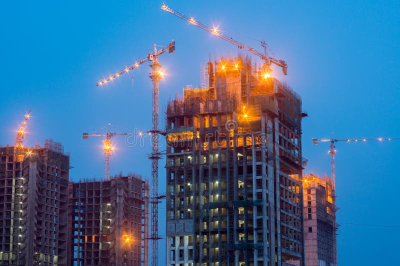 Construction Work on Building at Night Stock Photo - Image of crane ...