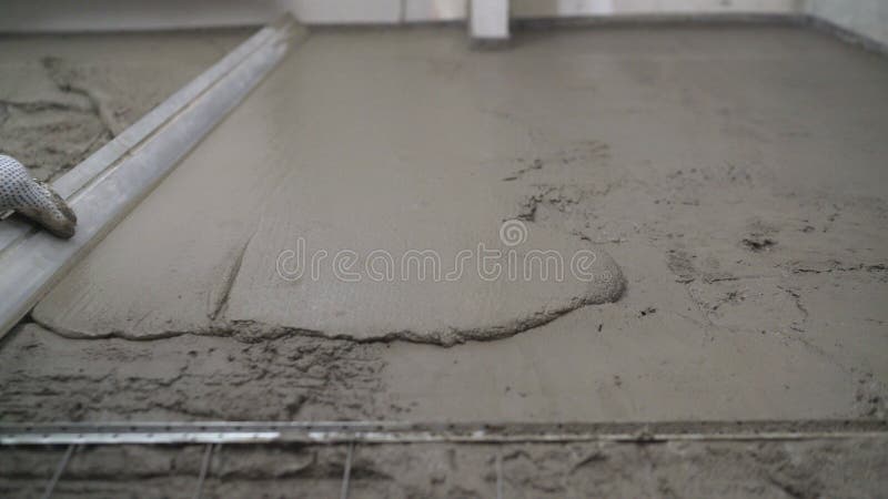 The Process of Leveling Floors in the Apartment with a Solution ...