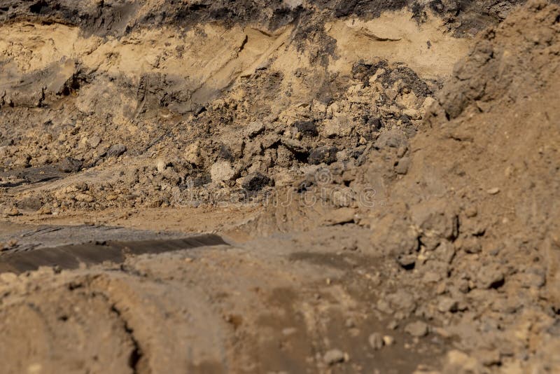 Construction Work during the Excavation of a Pit for Laying Different ...