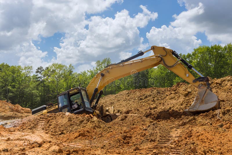 During Construction Work the Excavator Stuck in a Clay Pit Stock Photo ...