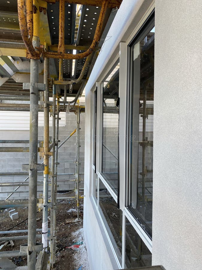 Construction Work of a House with Scaffolding and Aluminum Frame ...