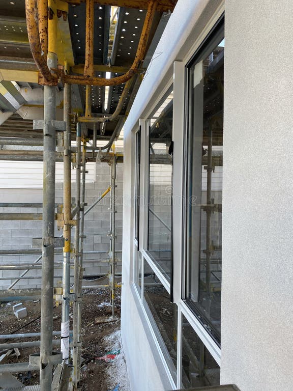 Construction Work of a House with Scaffolding and Aluminum Frame ...