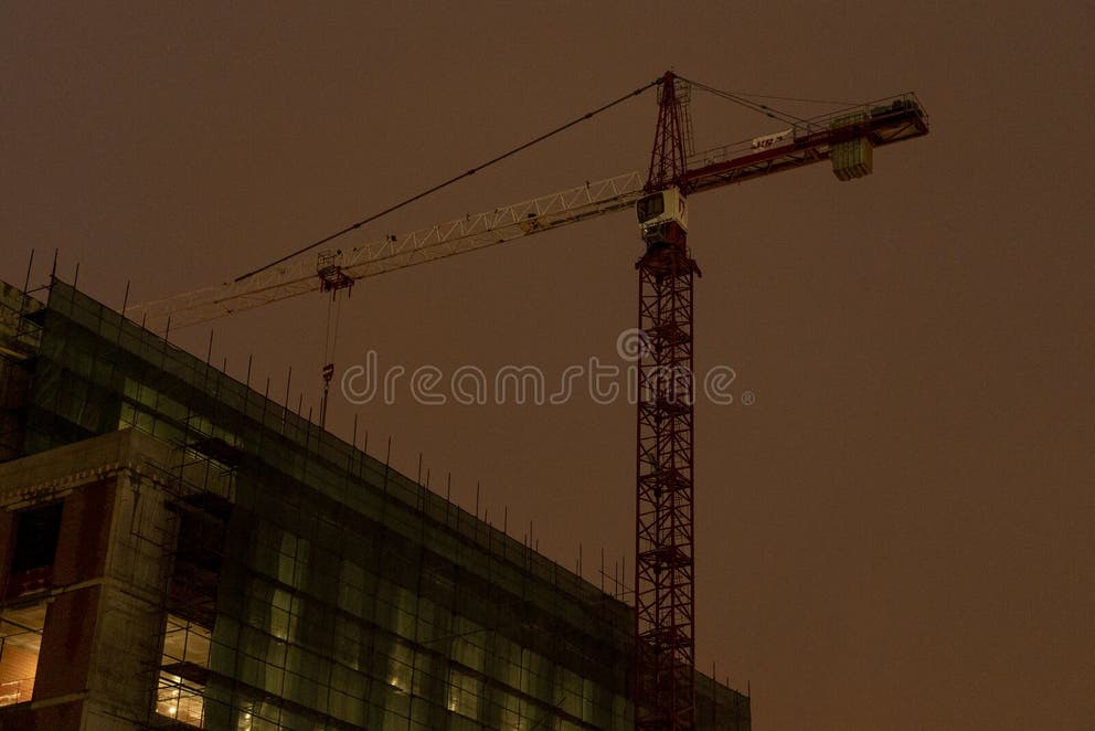 Construction Work of Houses at Night, Crane Loader at Night on the ...