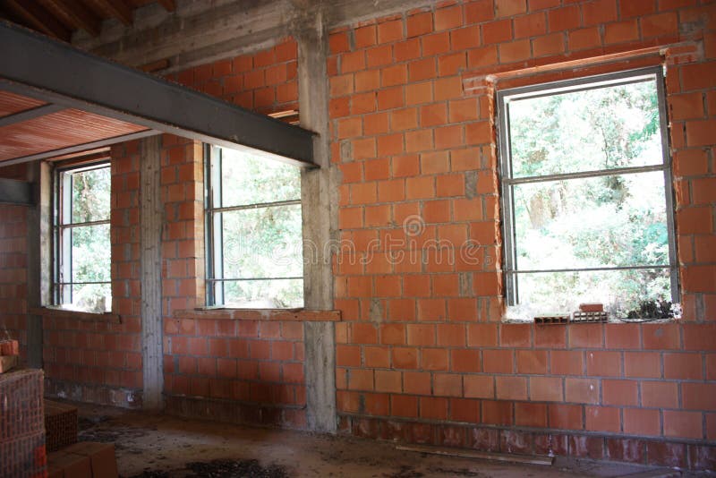 Construction Work in an Incomplete Red Brick and Concrete House with ...