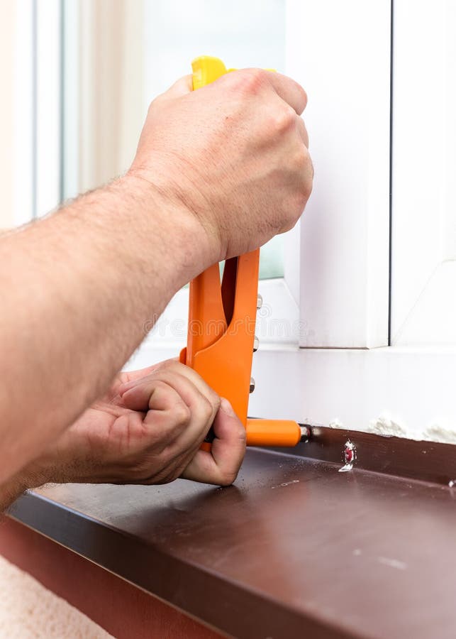 Construction Work - Installation of Rivets. Window Tint Repair. Plastic ...