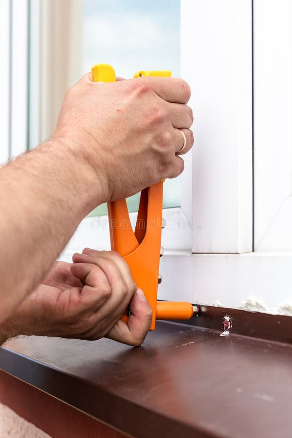 Construction Work - Installation of Rivets. Window Tint Repair. Plastic ...