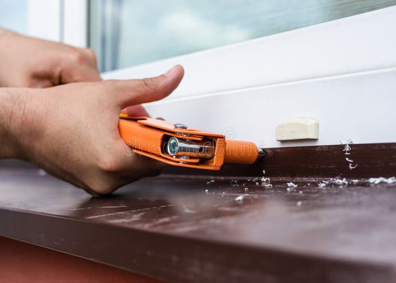 Construction Work - Installation of Rivets. Window Tint Repair. Plastic ...