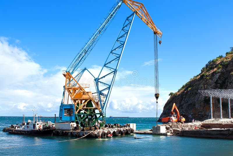 Construction work in port stock photo. Image of blue - 142192176