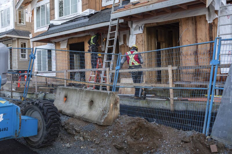 Construction Work Site with Cladding Being Installed on the Outside of ...