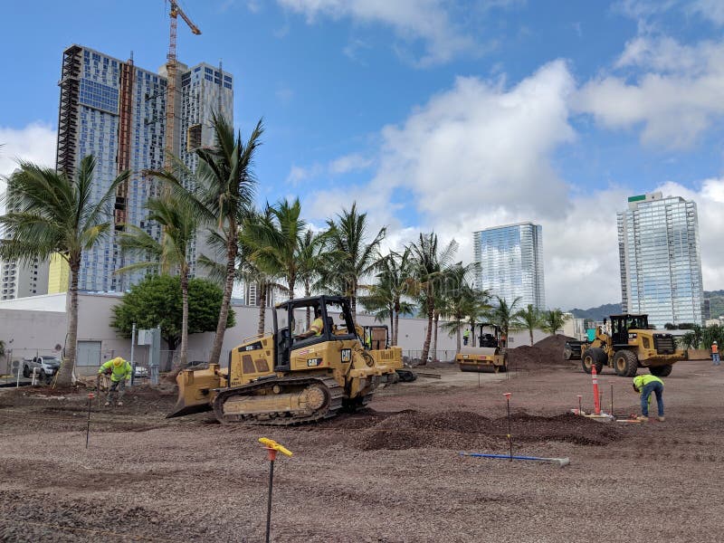Construction Work Underway at a Site in Honolulu with Heavy Machinery ...