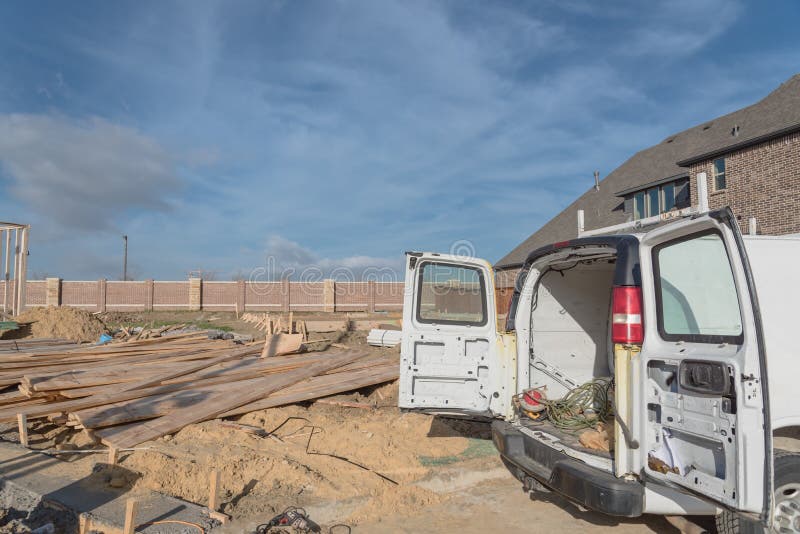 Work Van with Back Open and Tools at Construction Site Stock Photo ...