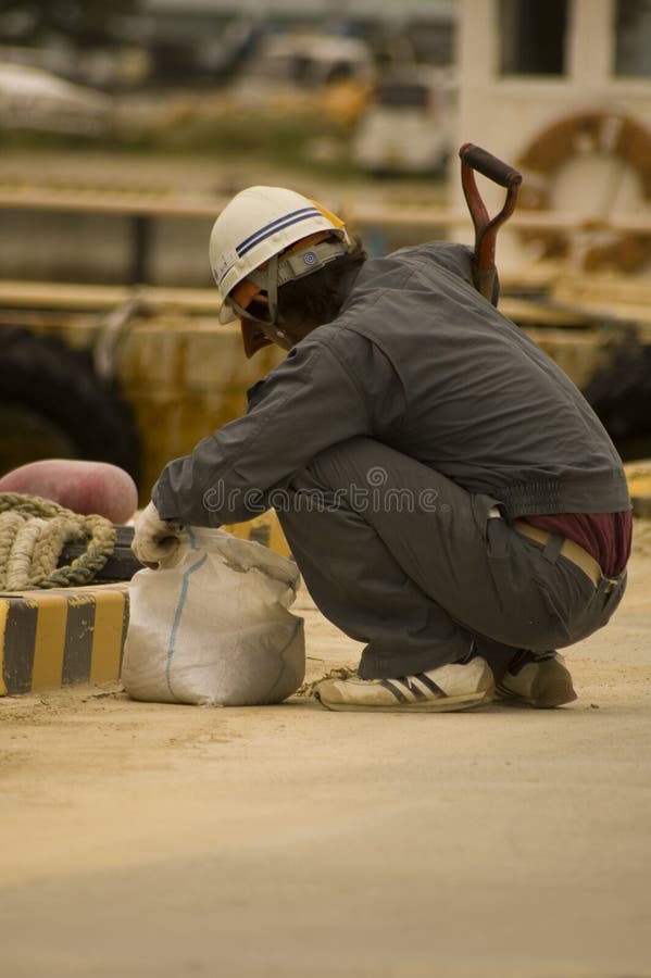 Construction worker stock photo. Image of crouch, worker - 2569216