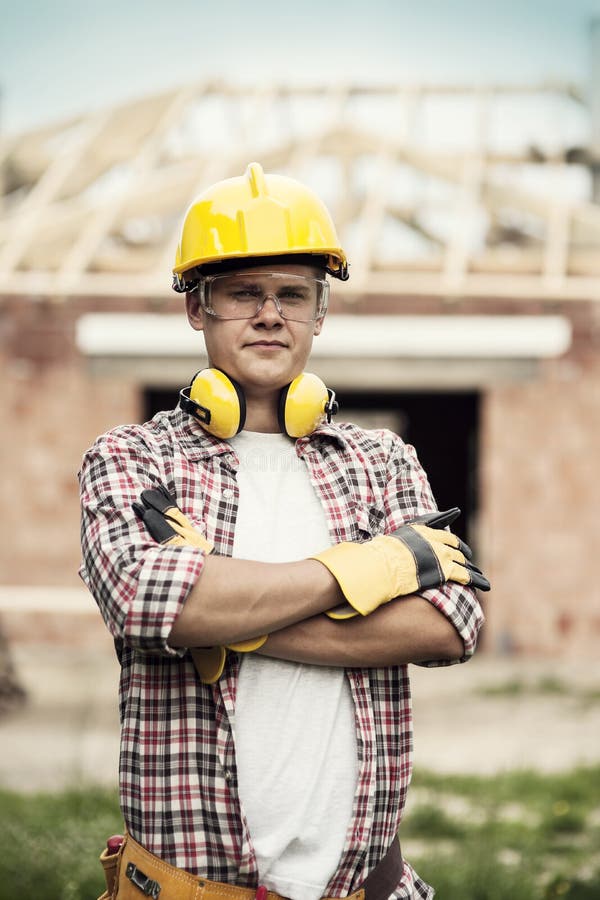 Smiling Worker with Tools in Many Hands Stock Photo - Image of ...
