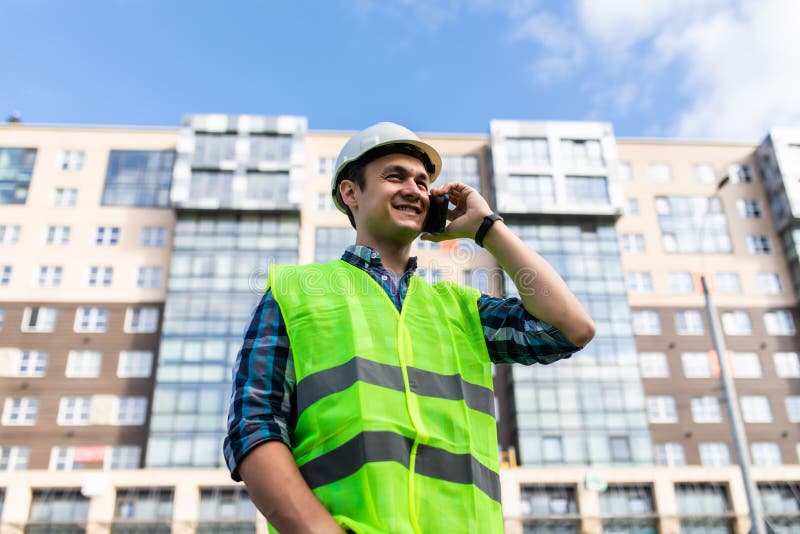 Construction Young Worker Activity with Mobile Phone Under New Building ...
