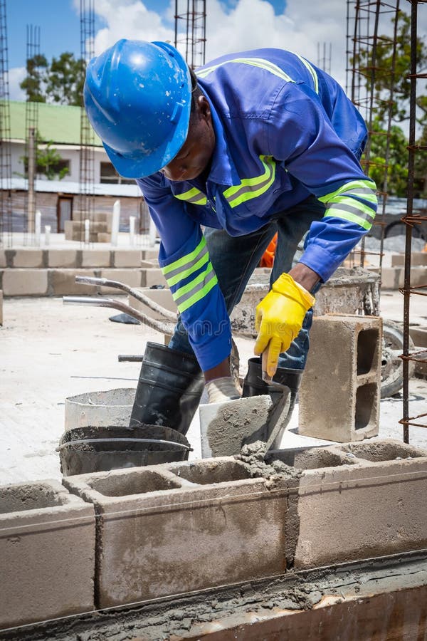 Construction Worker Adding Cement with a Trowel To Brickwork Editorial ...