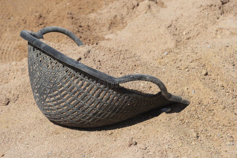 Construction Worker : Alone of Buckets with Sand Set Up Outdoors with ...