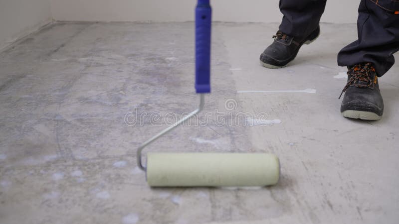 Construction Worker Applying Primer To Concrete Floor. Stock Video ...