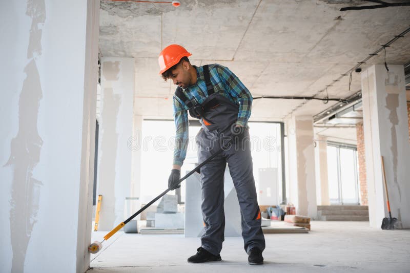 Construction Worker Applying Waterproofing Material on Floor Inside ...