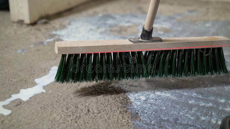 Construction Worker Applying Waterproofing Membrane with Broom on ...