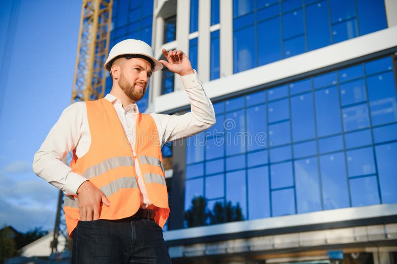 Construction Worker or Architect in Construction Site Outdoors with Hot ...