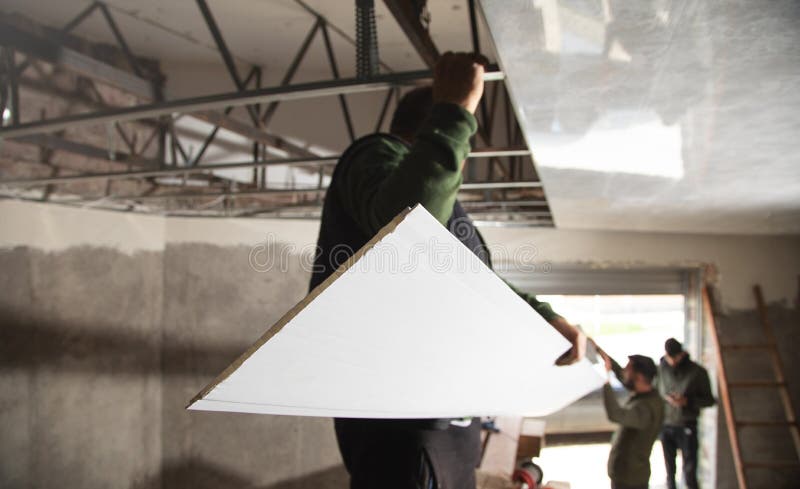 Construction Worker Assemble a Suspended Ceiling Stock Photo - Image of ...