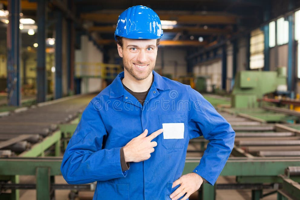 Construction Worker in Assembly Hall Stock Photo - Image of masculine ...