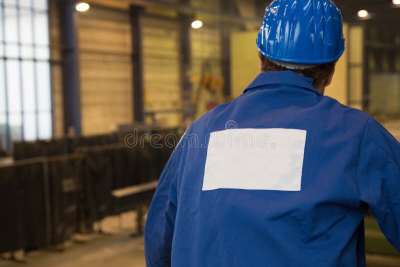 Construction Worker in Assembly Hall Stock Image - Image of male ...