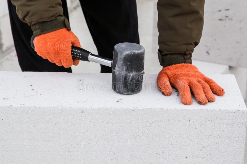 Builder is Beating a Part of the Wall with a Hammer Stock Image - Image ...