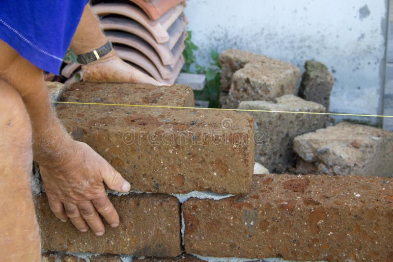Construction Worker Building a Brick Wall Stock Photo - Image of ...