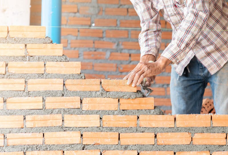 Construction Worker are Building a Brick Wall Stock Photo - Image of ...