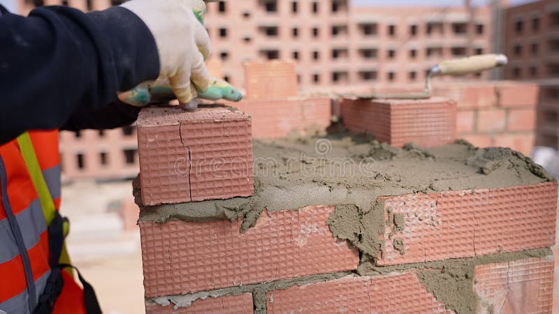 Worker Laying Bricks at Construction Site, Building New House with ...