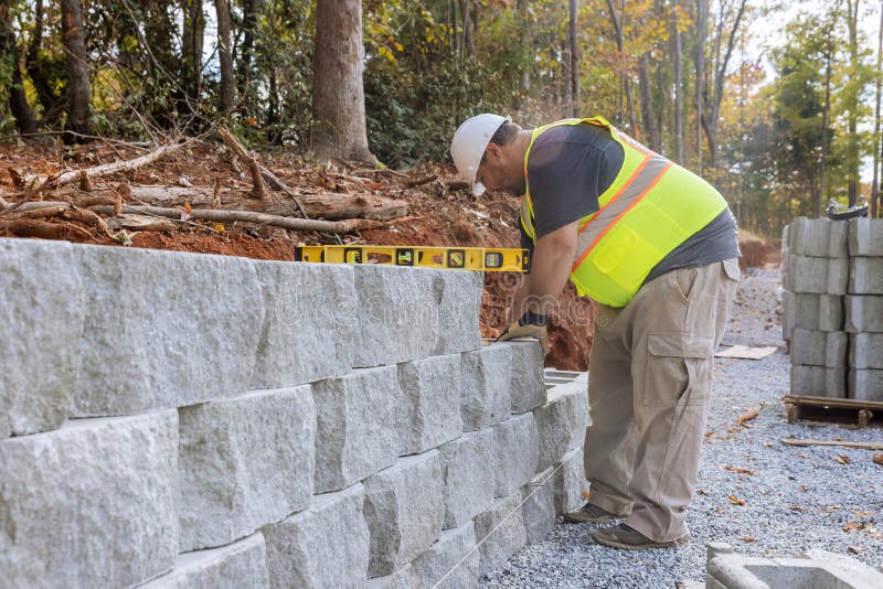 During the Construction of a Retaining Wall on a New Property, a ...