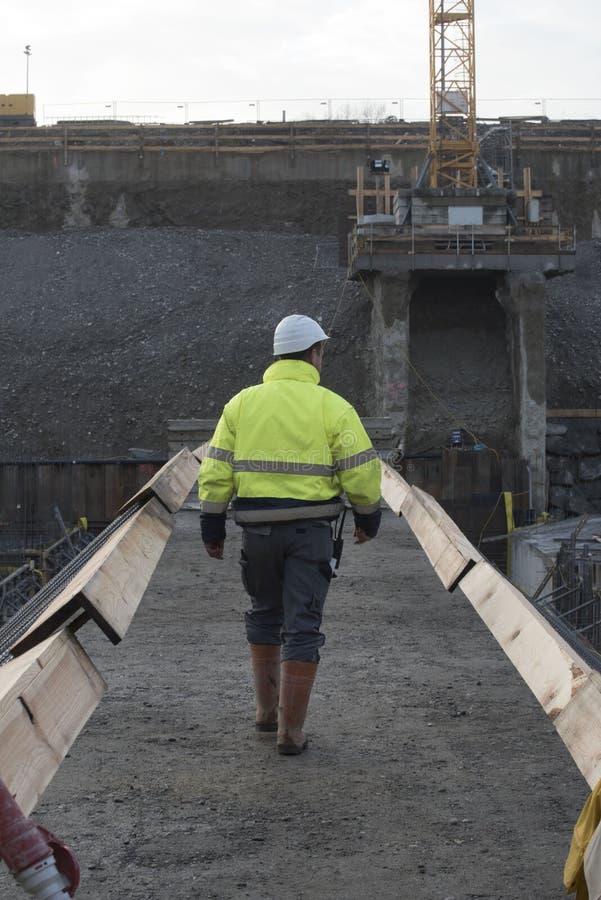 Construction Worker at a Building Site Stock Photo - Image of ...