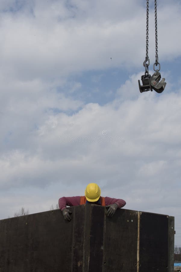 Construction Worker at a Building Site Stock Photo - Image of assemble ...