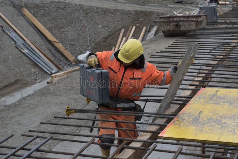 Construction Worker at a Building Site Editorial Photo - Image of labor ...