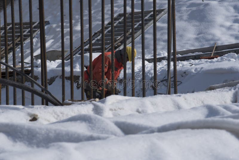 Construction Worker at a Building Site Stock Photo - Image of assemble ...