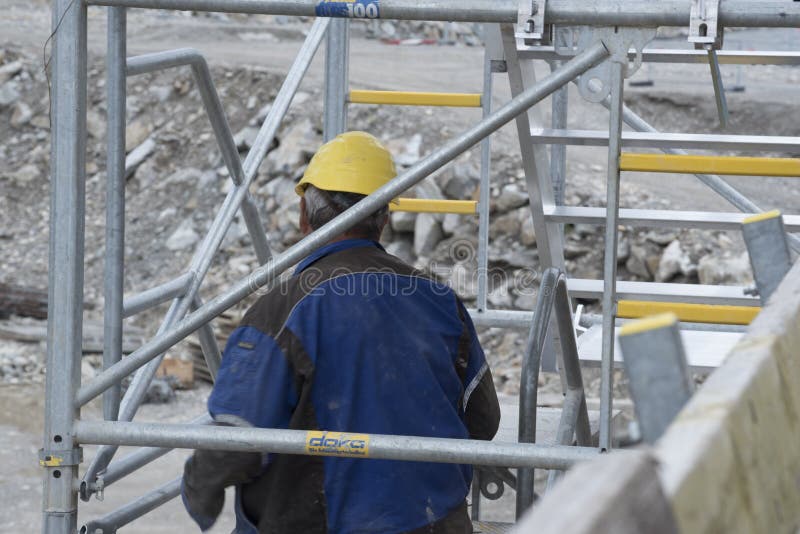 Construction Worker at a Building Site Stock Image - Image of assemble ...